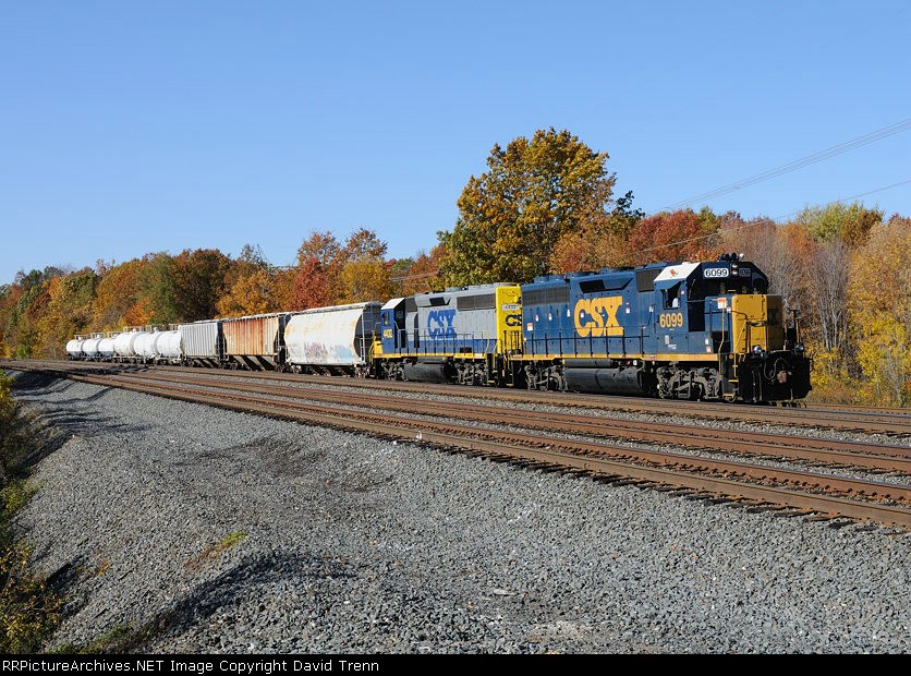 CSX 6099 leads Eastbouid CSX C718 at MP 127 on track number three